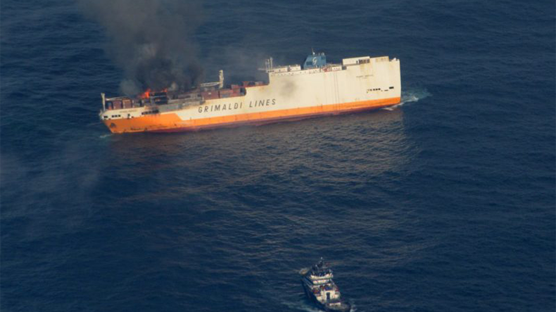 Grimaldi crew evacuated after container fire :: Lloyd's List