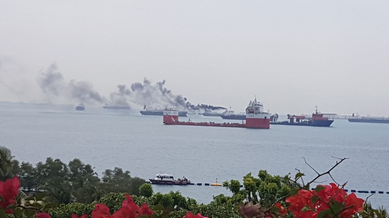 Crew evacuated after chemical tanker catches fire off Singapore ...